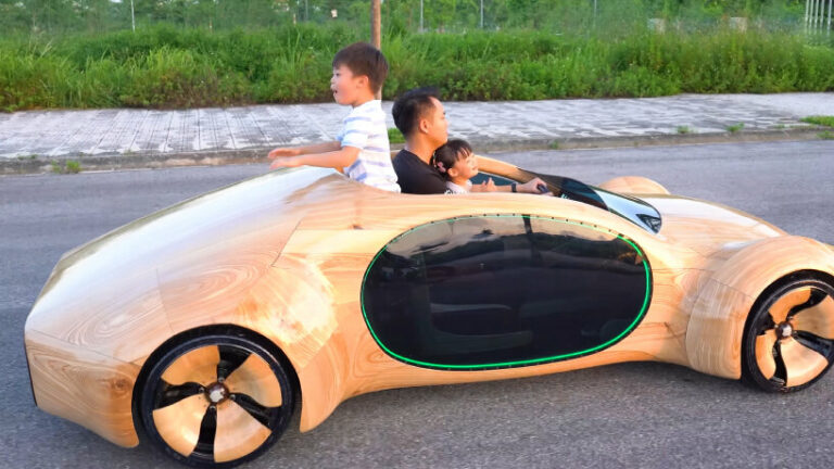 real-life apple concept car drives around as handmade wooden vehicle ...