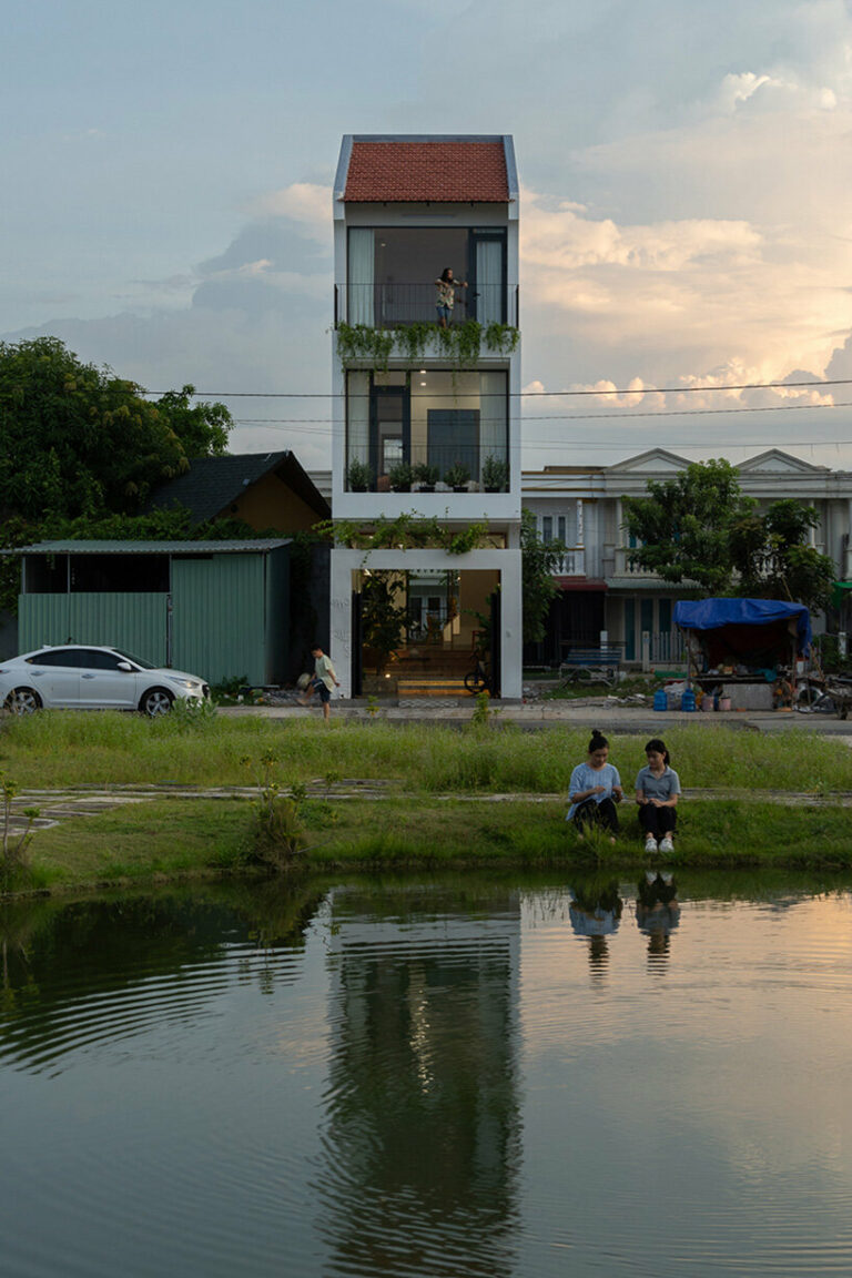 dual facades and central skylight illuminate dat tran's residence in western vietnam