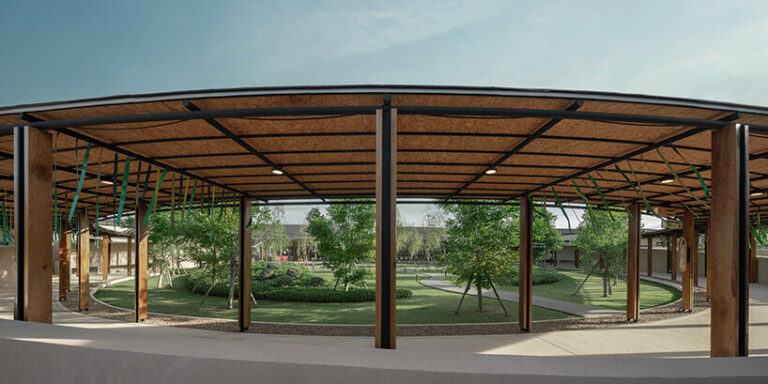 mobius studio designs 'egg yolk' shaped building in thailand