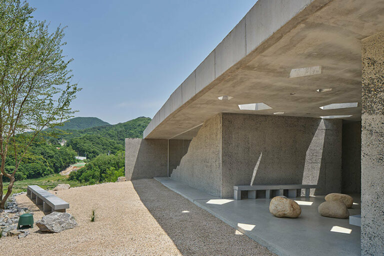 nameless architecture's concretewall café is an austere rock garden in ...