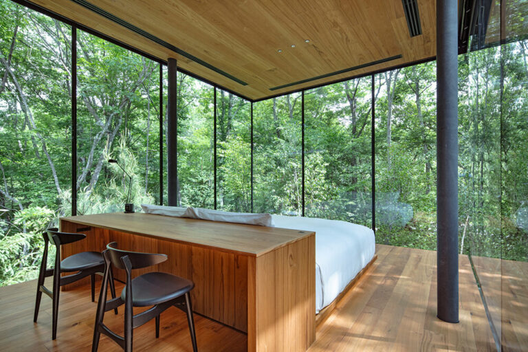 NOT A HOTEL KITAKARUIZAWA IRORI blends wood & glass in japanese forest