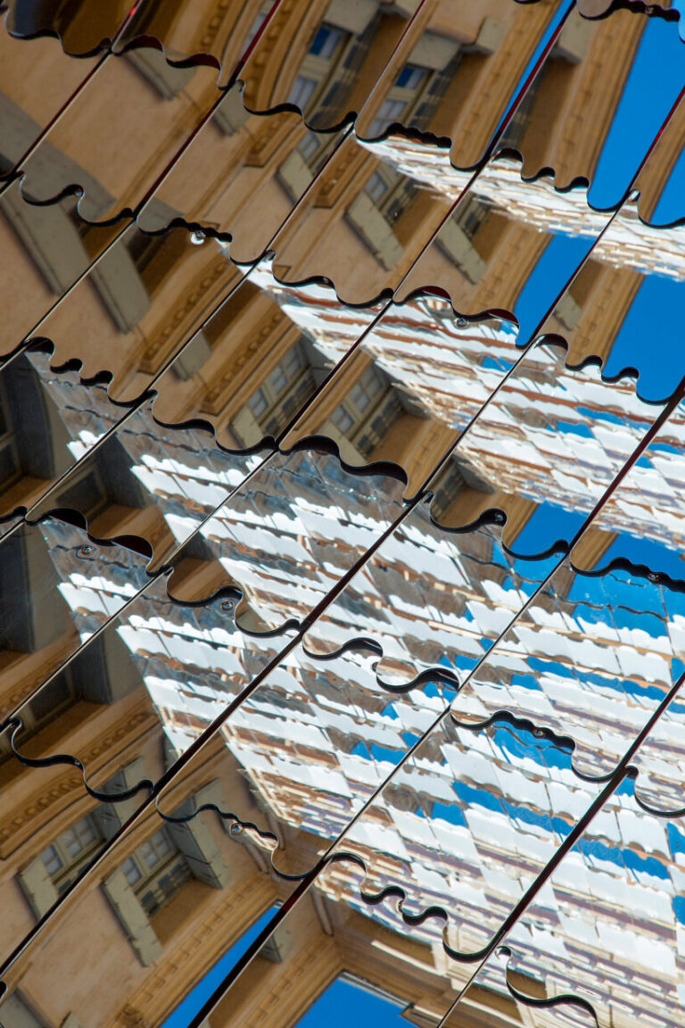 kinetic mirror pavilion's living facade reflects french monument for ...