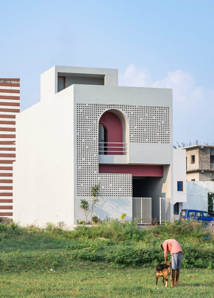 perforated terracotta facade enfolds rahul pudale's porous adobe in india