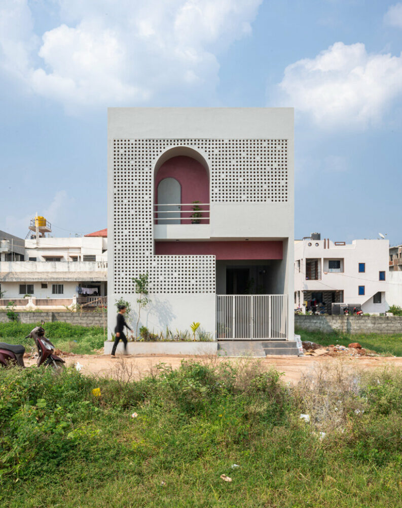 perforated terracotta facade enfolds rahul pudale's porous adobe in india