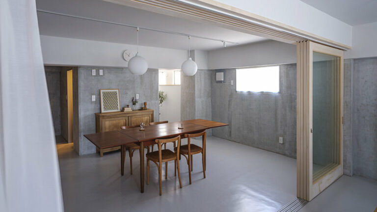 adaptable fabric partitions divide raumus' renovated soft workspace in ...