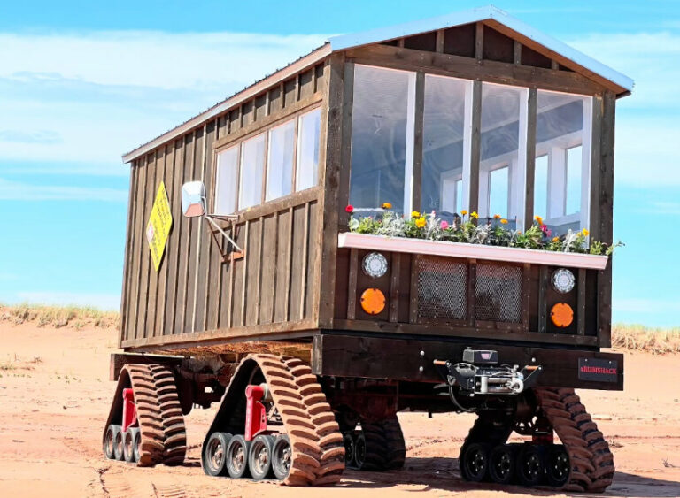 mobile tiny house on tracks ‘rubishack’ drives on hills, sand and water ...