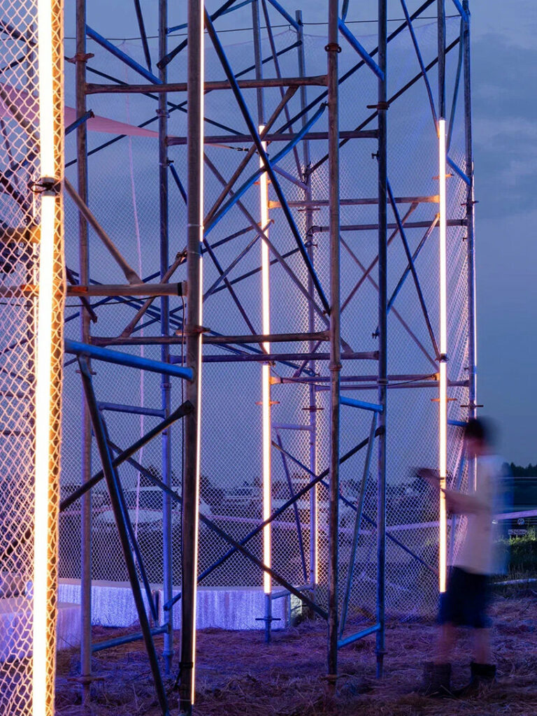 scaffolding and reclaimed pipes shape BQ studio's pavilion in russian land art festival