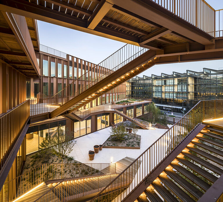 brenac & gonzalez & associés fronts wave-like building with vertical ...