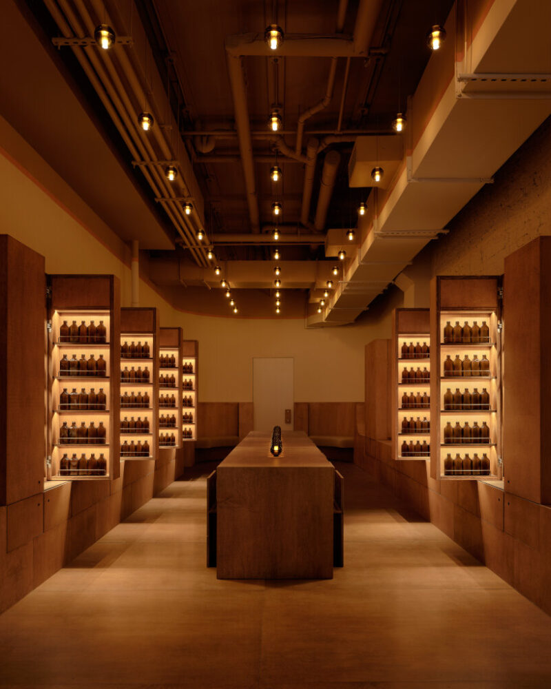 bocci’s rechargeable glass table lights illuminate aesop’s spaces in ...