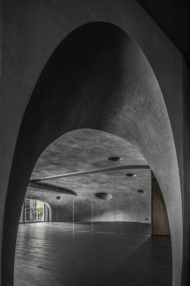 circular skylight illuminates cave-like meditation space by studio X4 ...