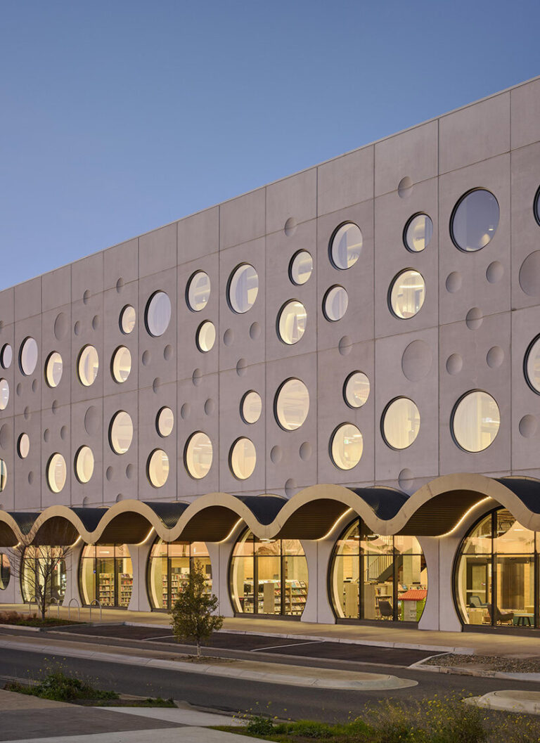 playful, circular windows punctuate buchan's library expressive facade ...