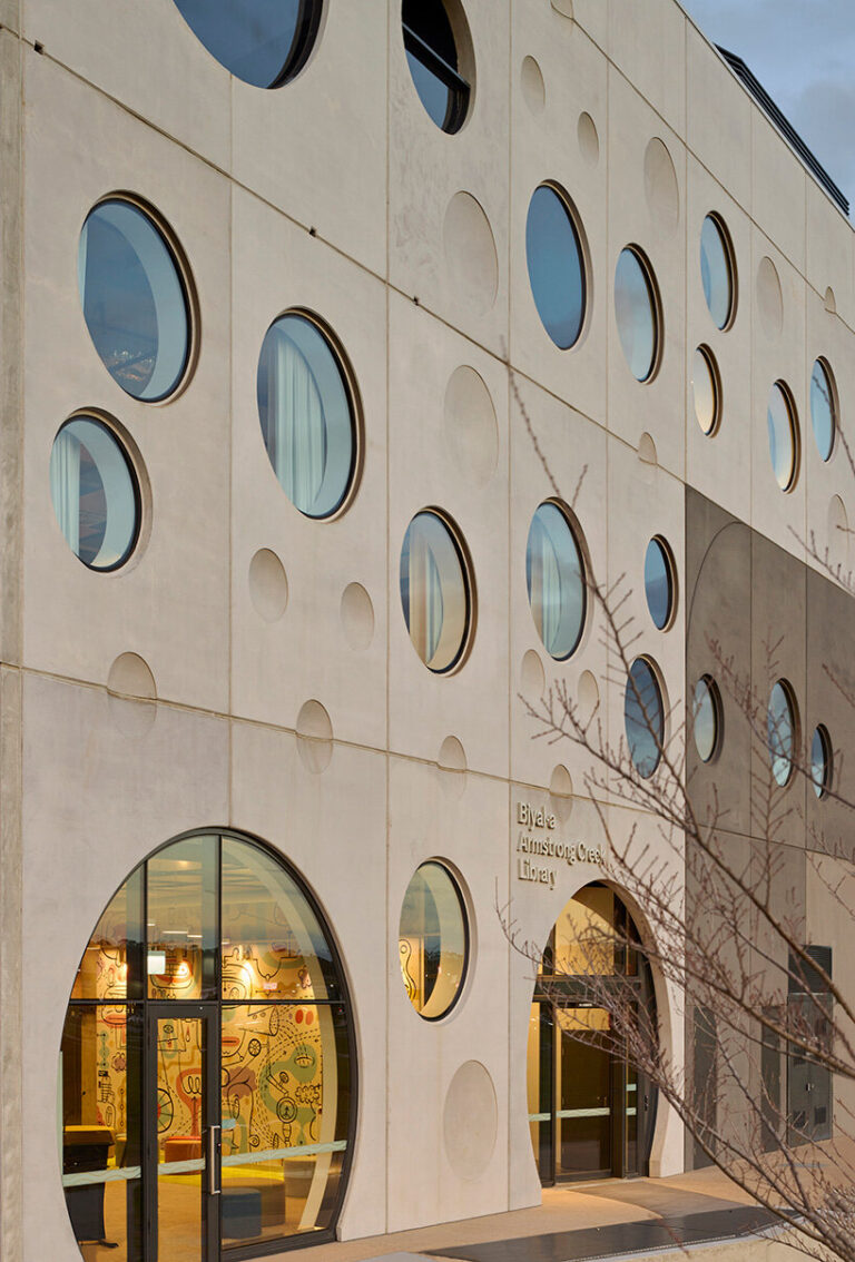playful, circular windows punctuate buchan's library expressive facade ...