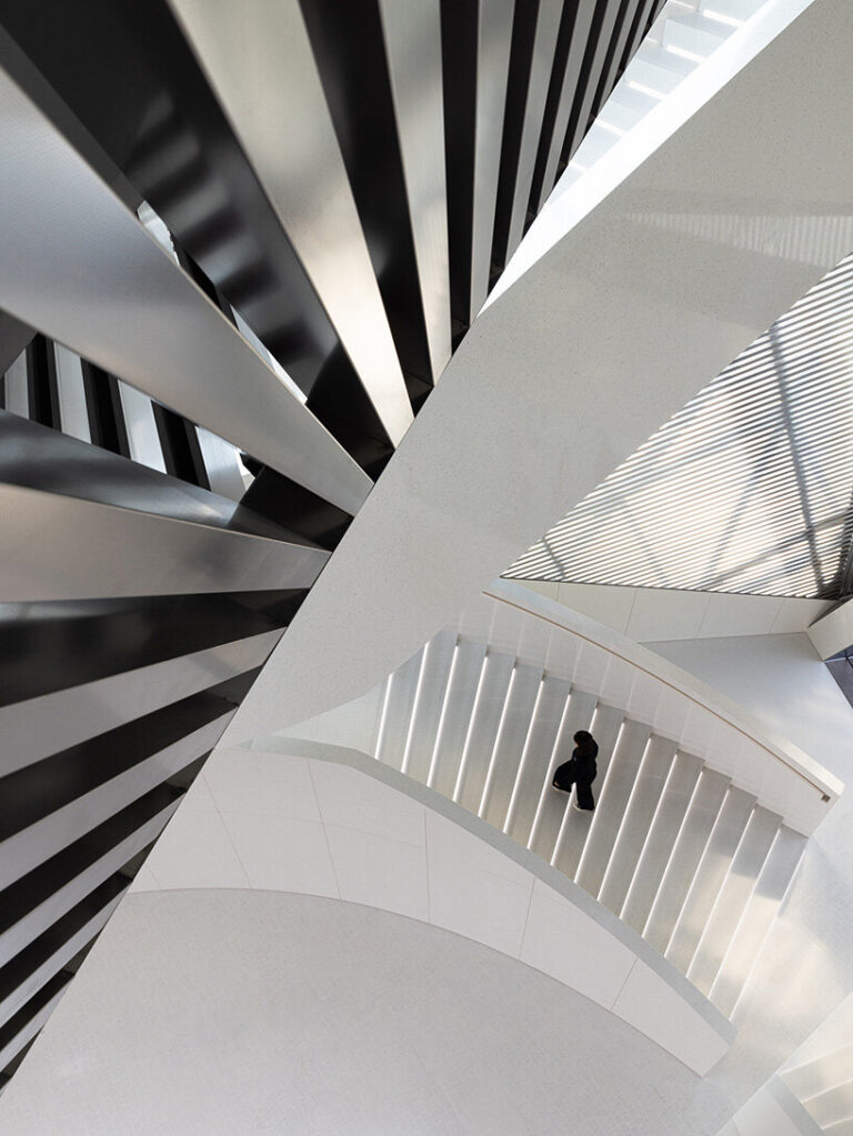 faceted glass curtain walls flood DJI's shenzhen origami-like flagship ...