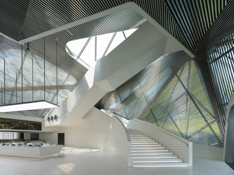 faceted glass curtain walls flood DJI's shenzhen origami-like flagship ...