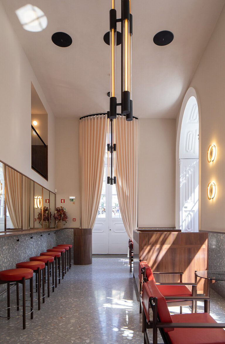 atelier sérgio rebelo converts bank building into restaurant in porto