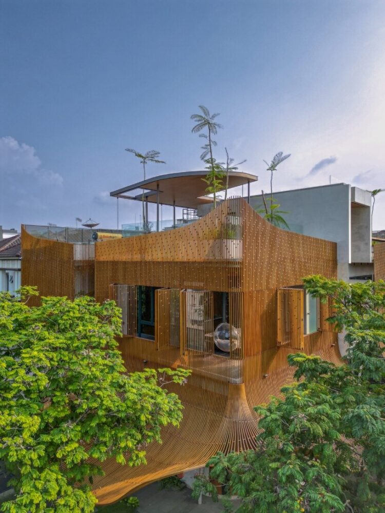 steel canopy protects lumintu house from sunlight in north jakarta