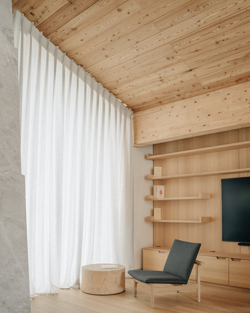 studio razavi revives alpine mountain house through modern lens