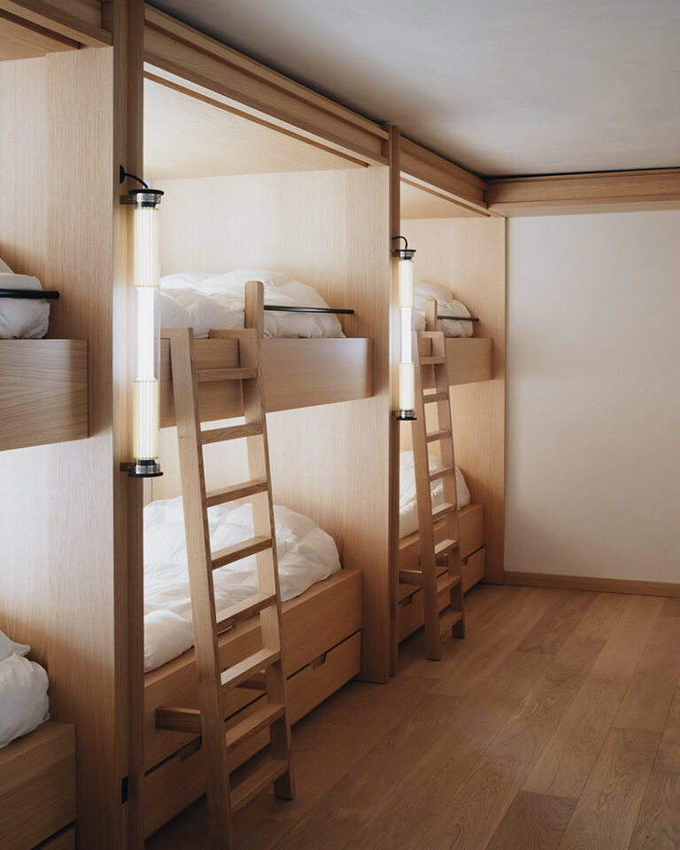 studio razavi revives alpine mountain house through modern lens