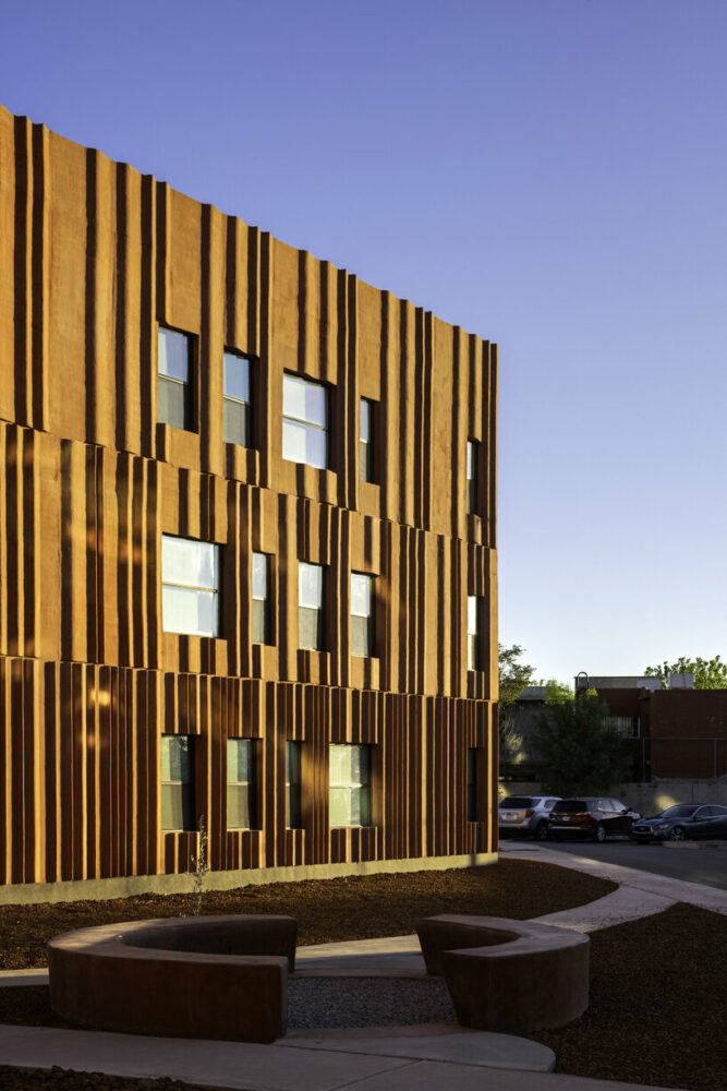 shadows shift throughout the day on RT2 apartments' undulating facade ...