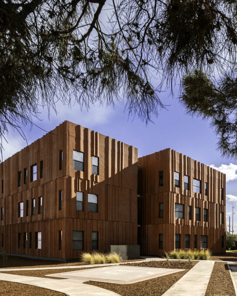 shadows shift throughout the day on RT2 apartments' undulating facade ...