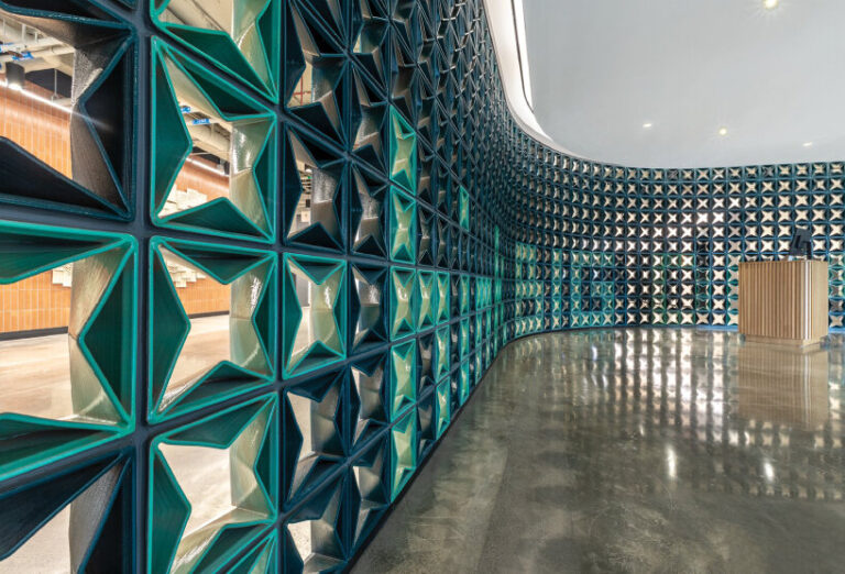 brian peters' 3D printed ceramic blocks wrap around screen wall at ...
