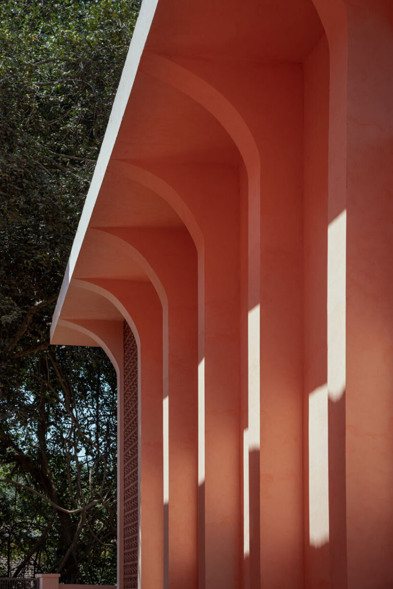 six u-shaped villas in north goa shape up bold pink arches around pool ...