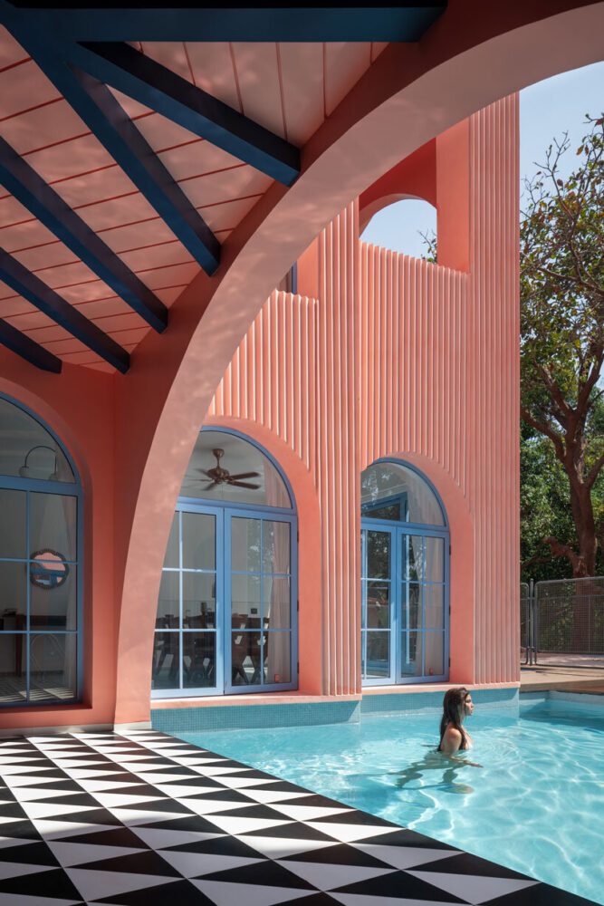 six u-shaped villas in north goa shape up bold pink arches around pool ...