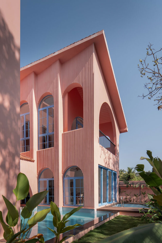 six u-shaped villas in north goa shape up bold pink arches around pool ...