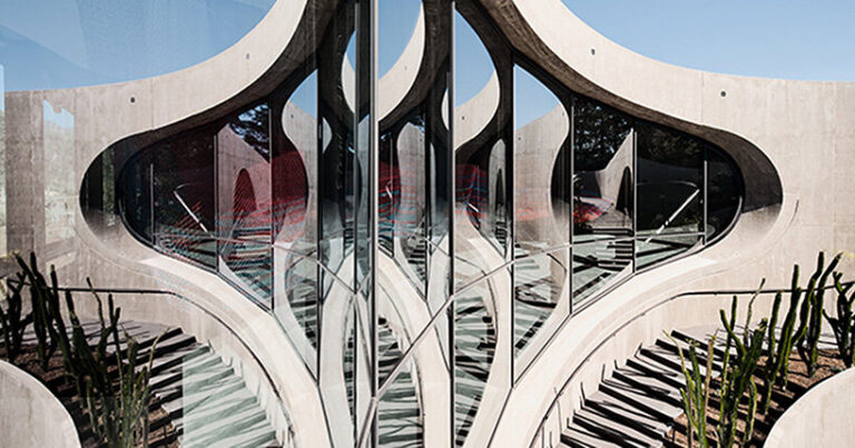 fluid concrete residence by donaldson + partners emerges from ...