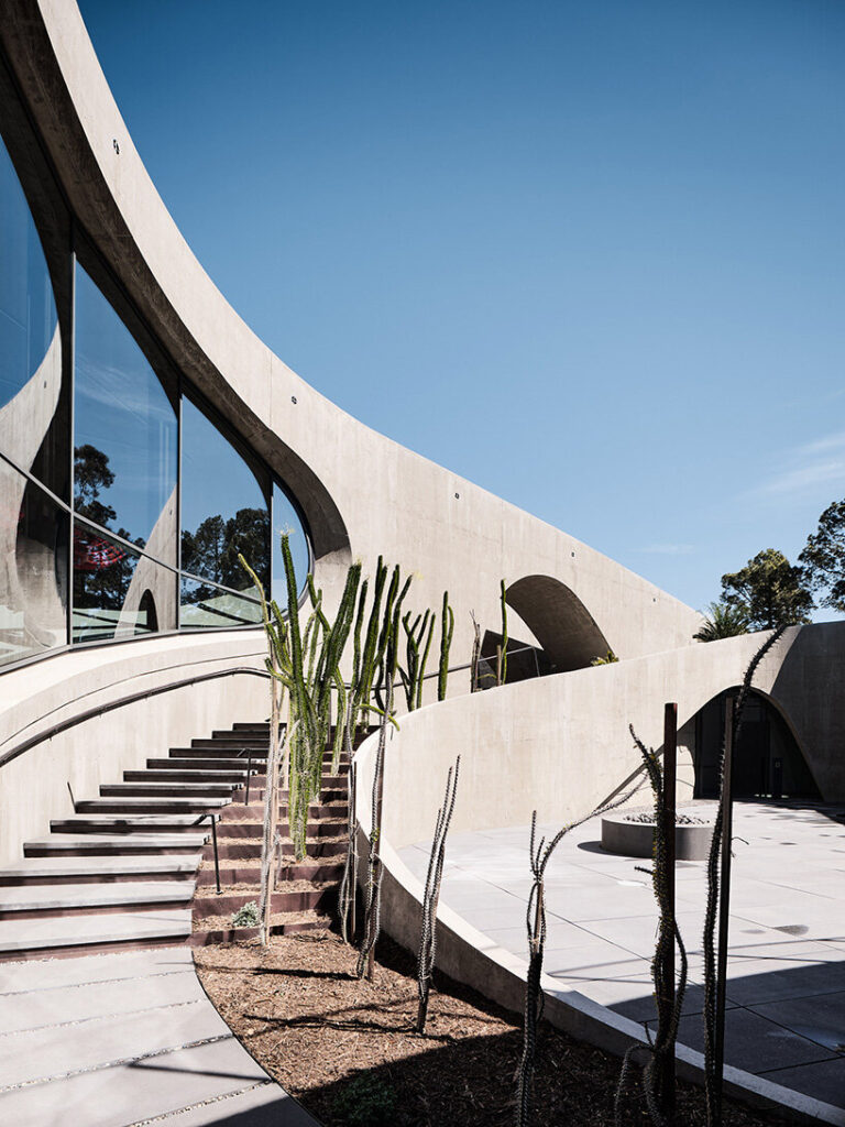 fluid concrete residence by donaldson + partners emerges from ...
