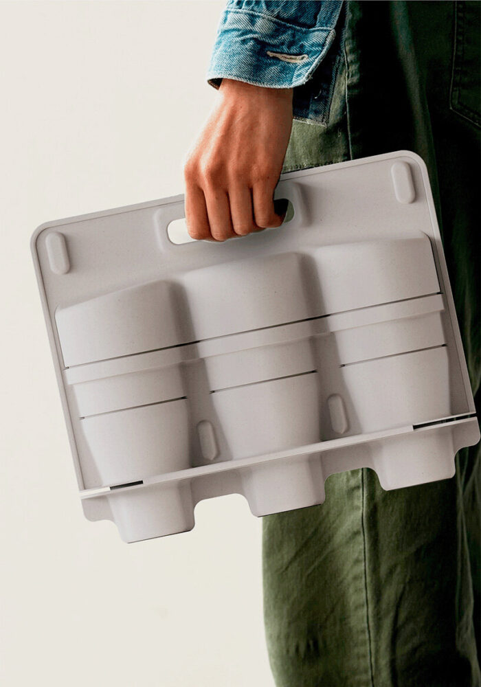compostable paper pulp briefcase by NOS keeps delivery secured