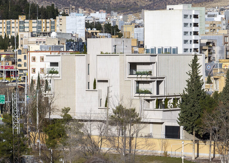 perforated brick facade by mohat office brings texture to iran's ...