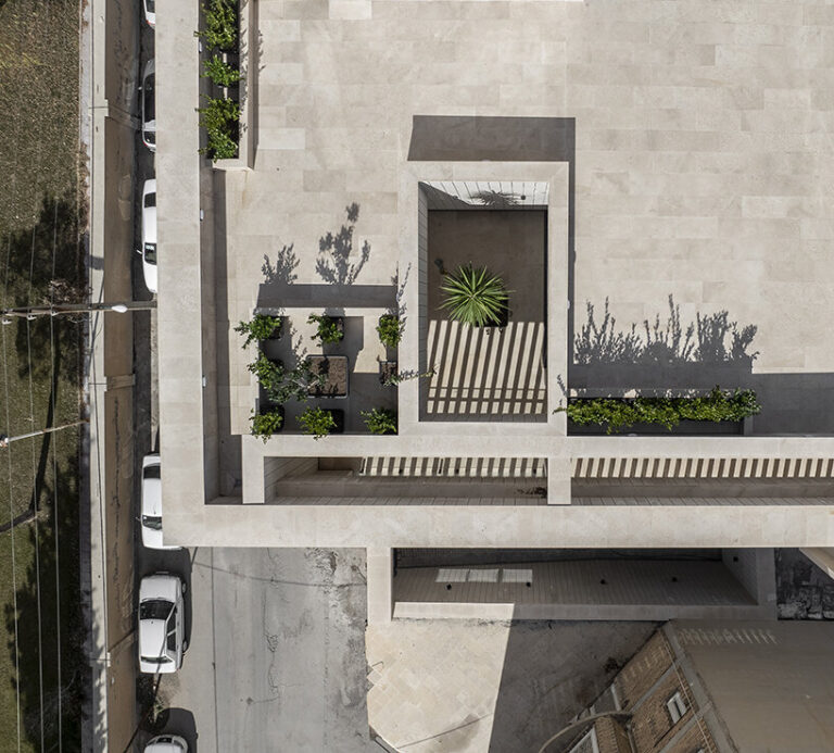 perforated brick facade by mohat office brings texture to iran's ...