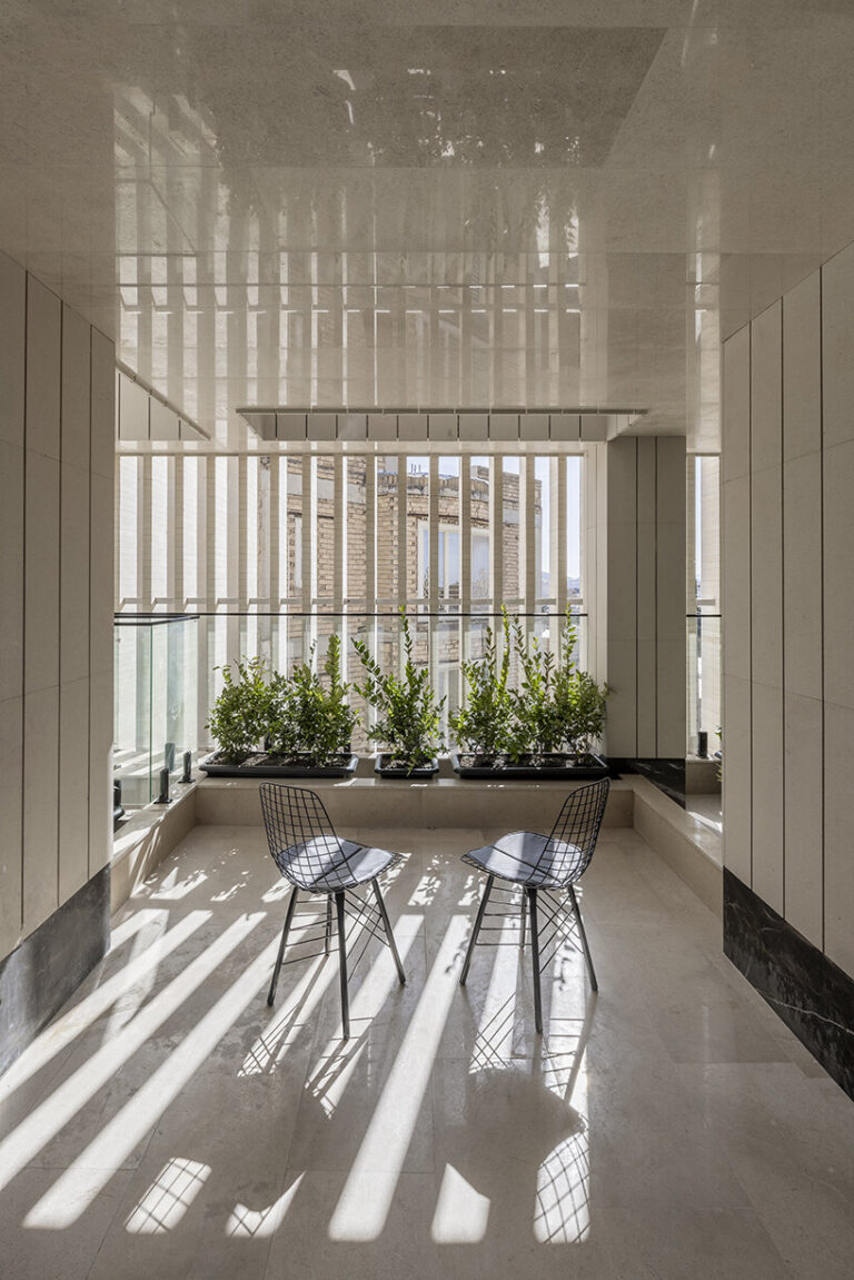 perforated brick facade by mohat office brings texture to iran's ...