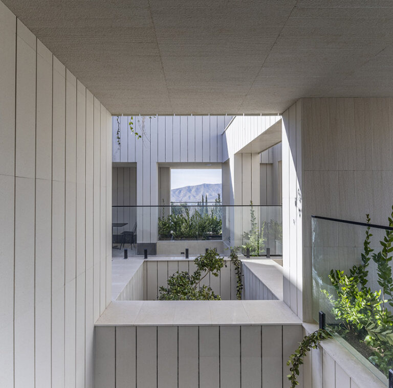 perforated brick facade by mohat office brings texture to iran's ...