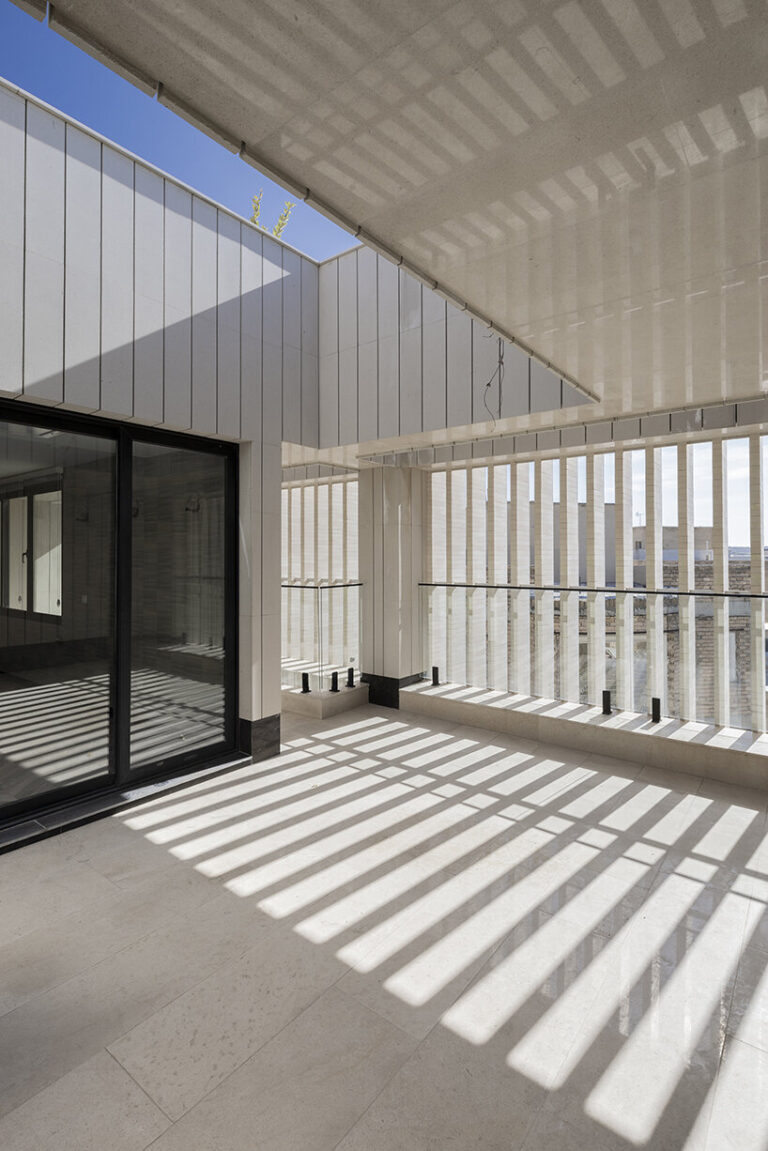 perforated brick facade by mohat office brings texture to iran's ...