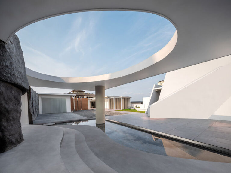 cylindrical columns and stone steps outline resoul rooftop concept store