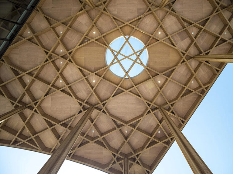 shigeru ban's toyota city museum illuminated with timber skylight