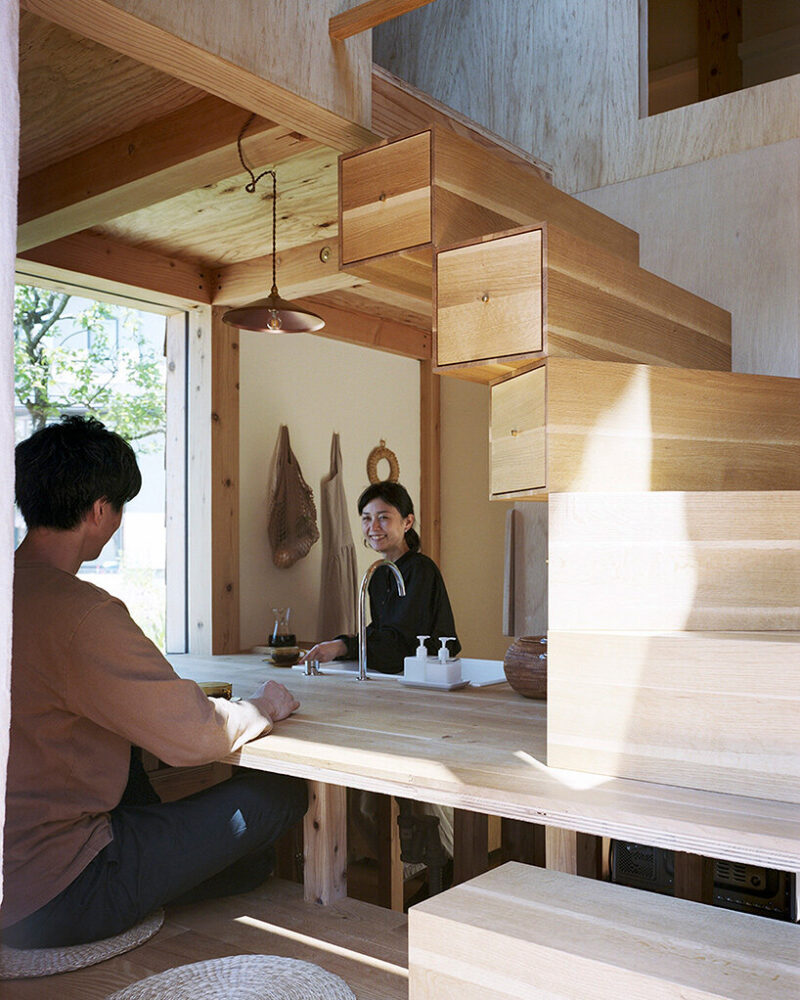 W architects tucks shingled 'double house' into japanese forest