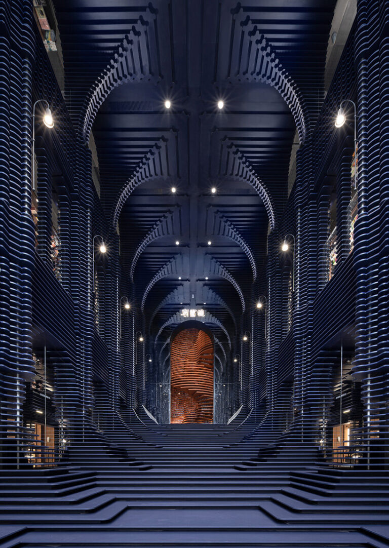 waves of custom-designed bricks ripple inside chinese bookstore by x+living