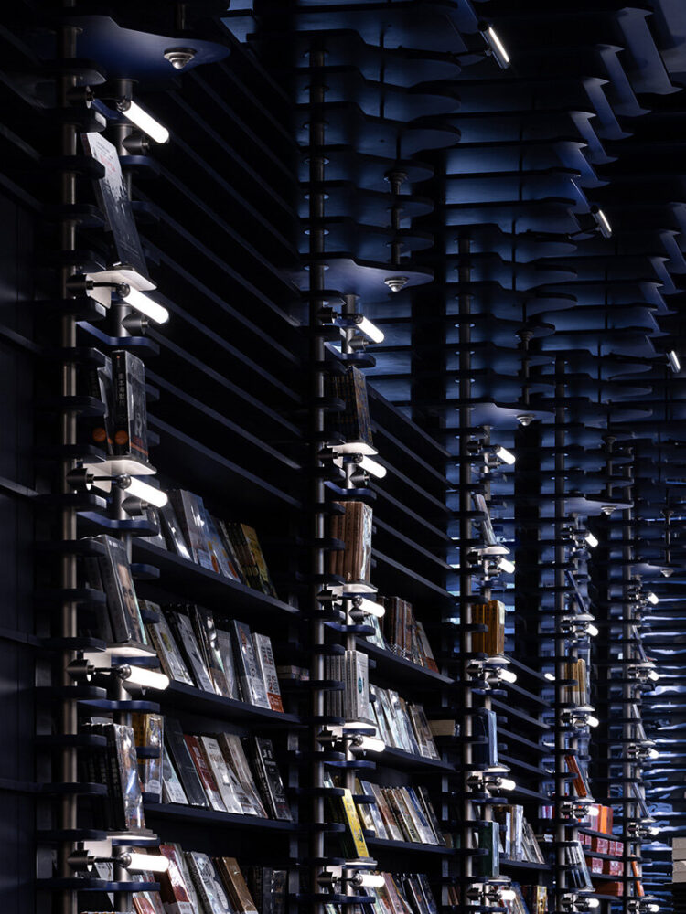 waves of custom-designed bricks ripple inside chinese bookstore by x+living