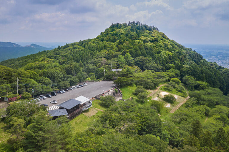 semi-circular terraces look over japanese forest park in renovation by ...