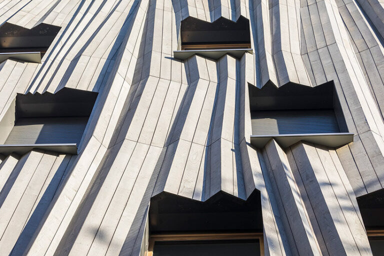 kengo kuma drapes 'yama-tani' housing in fluidly pleated timber