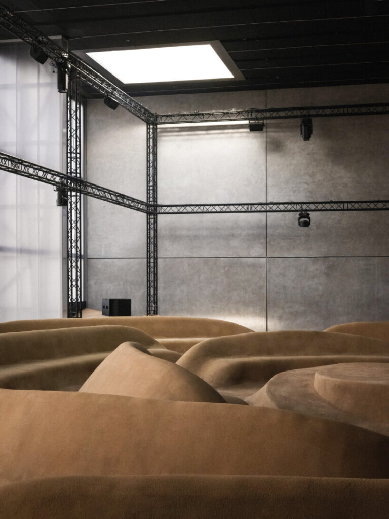 bottega veneta sculpts sand-colored seats into patterns of sound waves ...