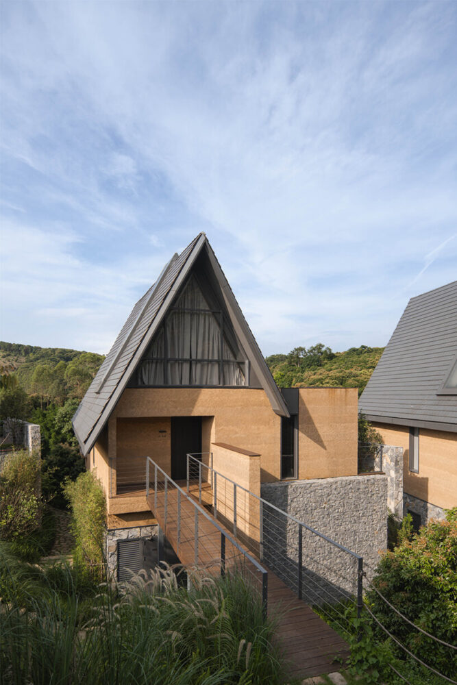 chinese resort by line+ embraces mountain rhythms with varied rooflines
