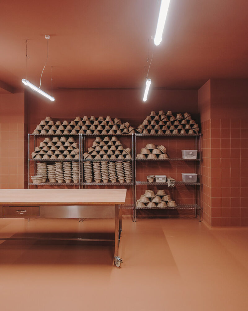 isern serra curates terracotta 'origo' café for historic barcelona