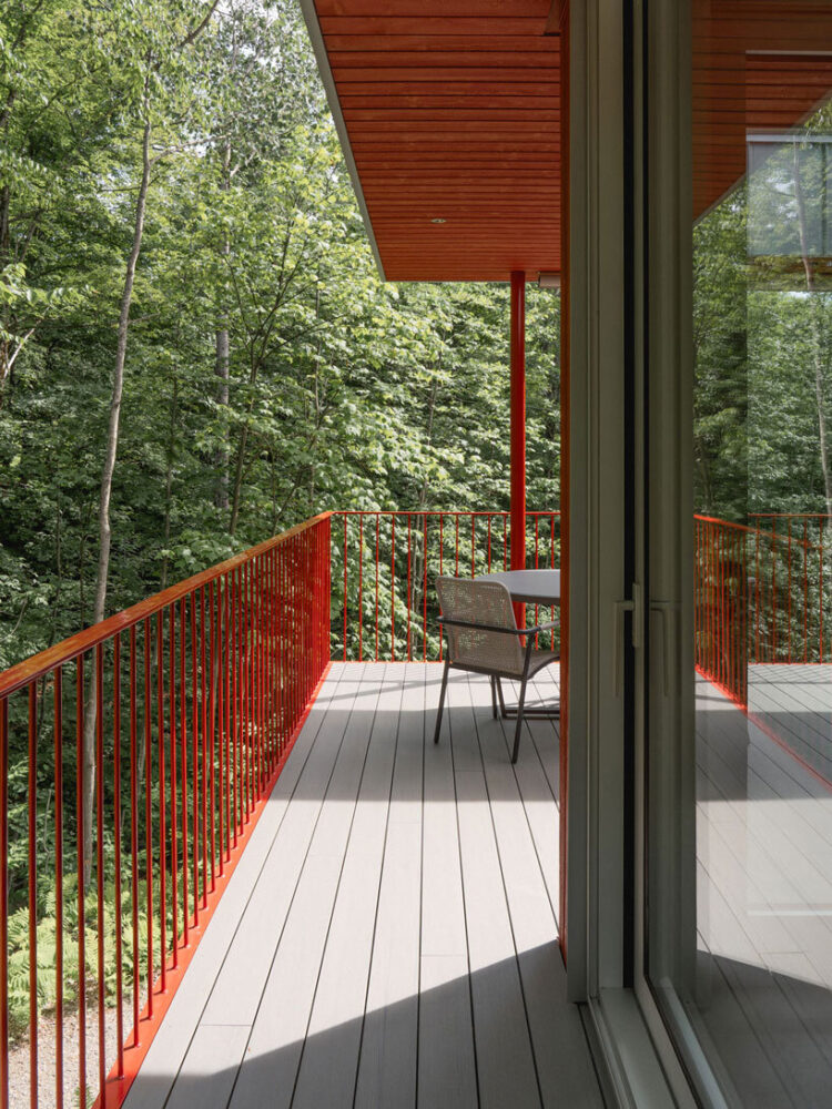 scarlet-red wood coats house by _naturehumaine floating above three ...