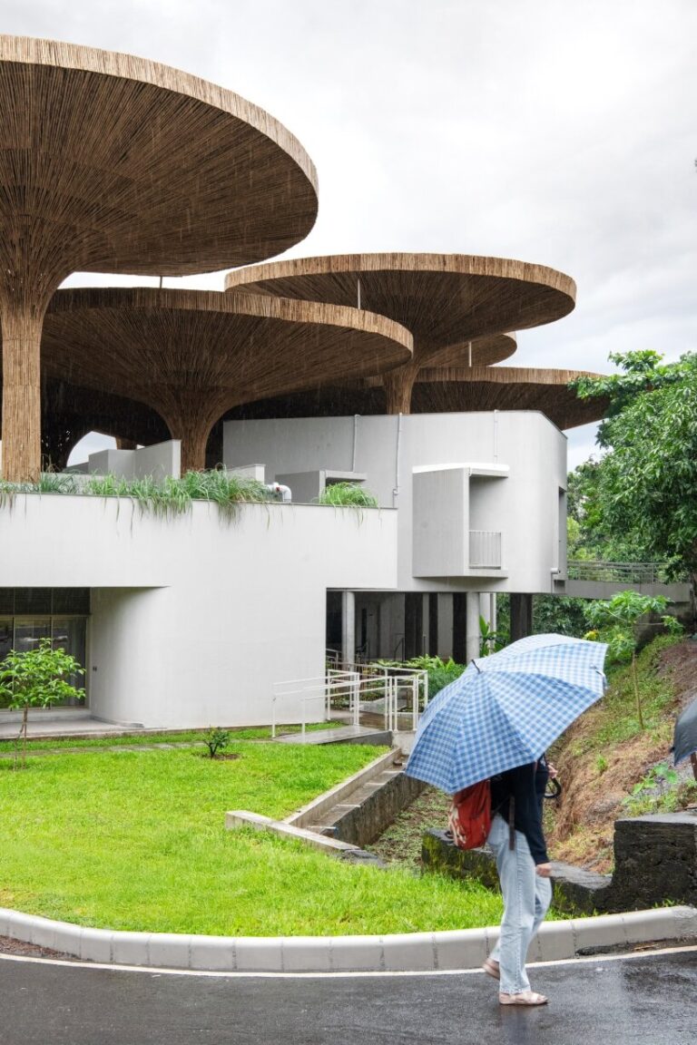 parasols crown communal hub in india by the purple ink studio