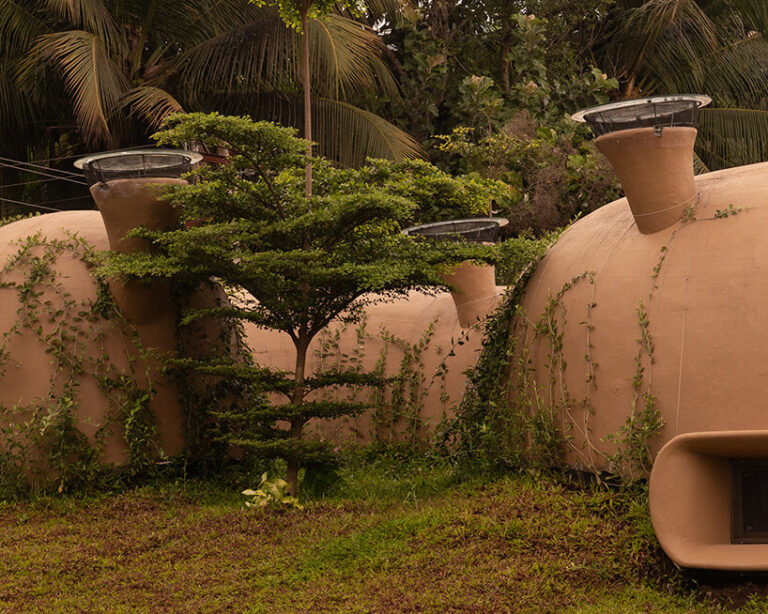 earthscape studio sculpts cavernous home from ferrocement shell