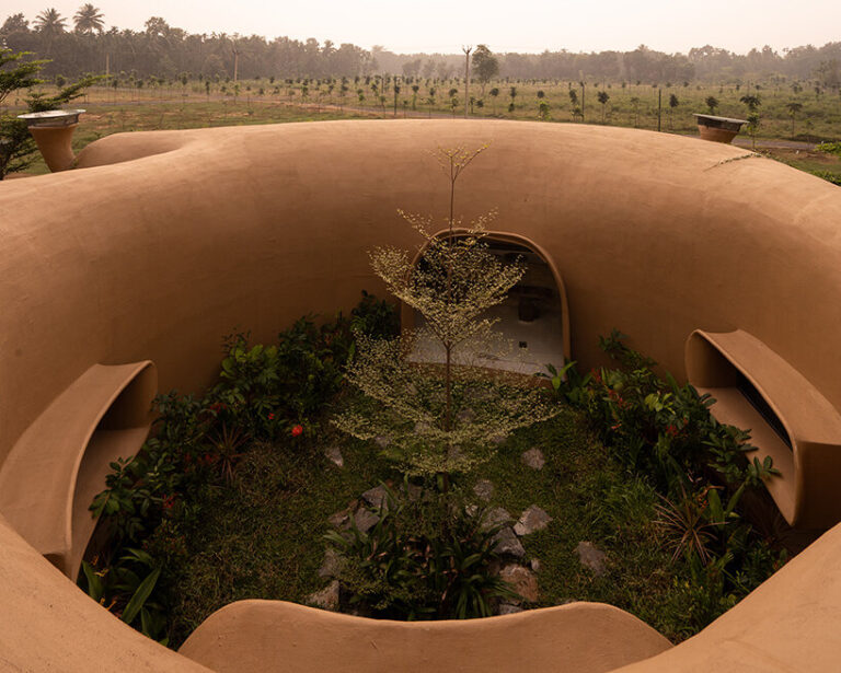 earthscape studio sculpts cavernous home from ferrocement shell